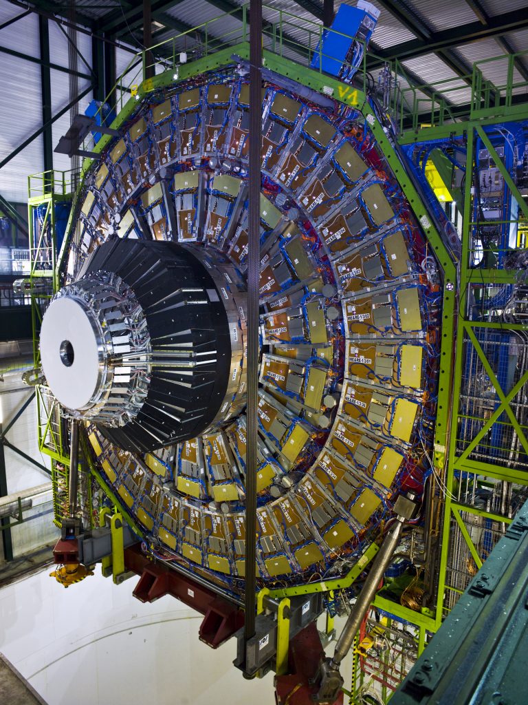 Last piece of CMS detector lowered underground